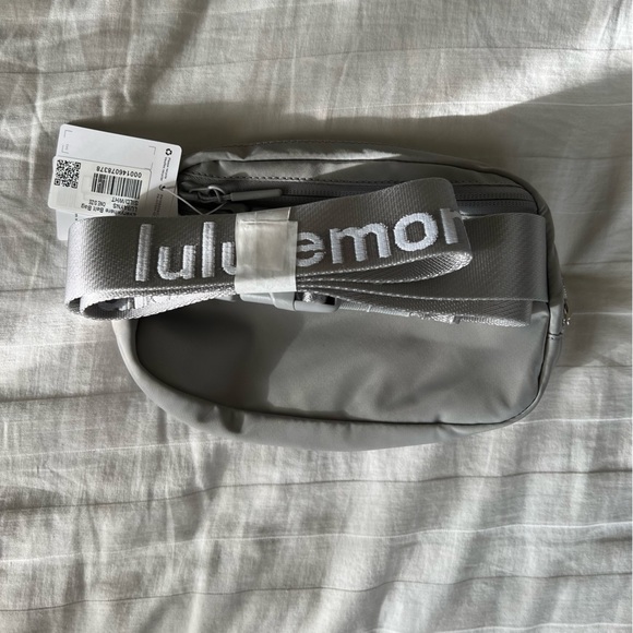 lululemon athletica | Bags | Lululemon Silver Drop Word Mark Everywhere ...